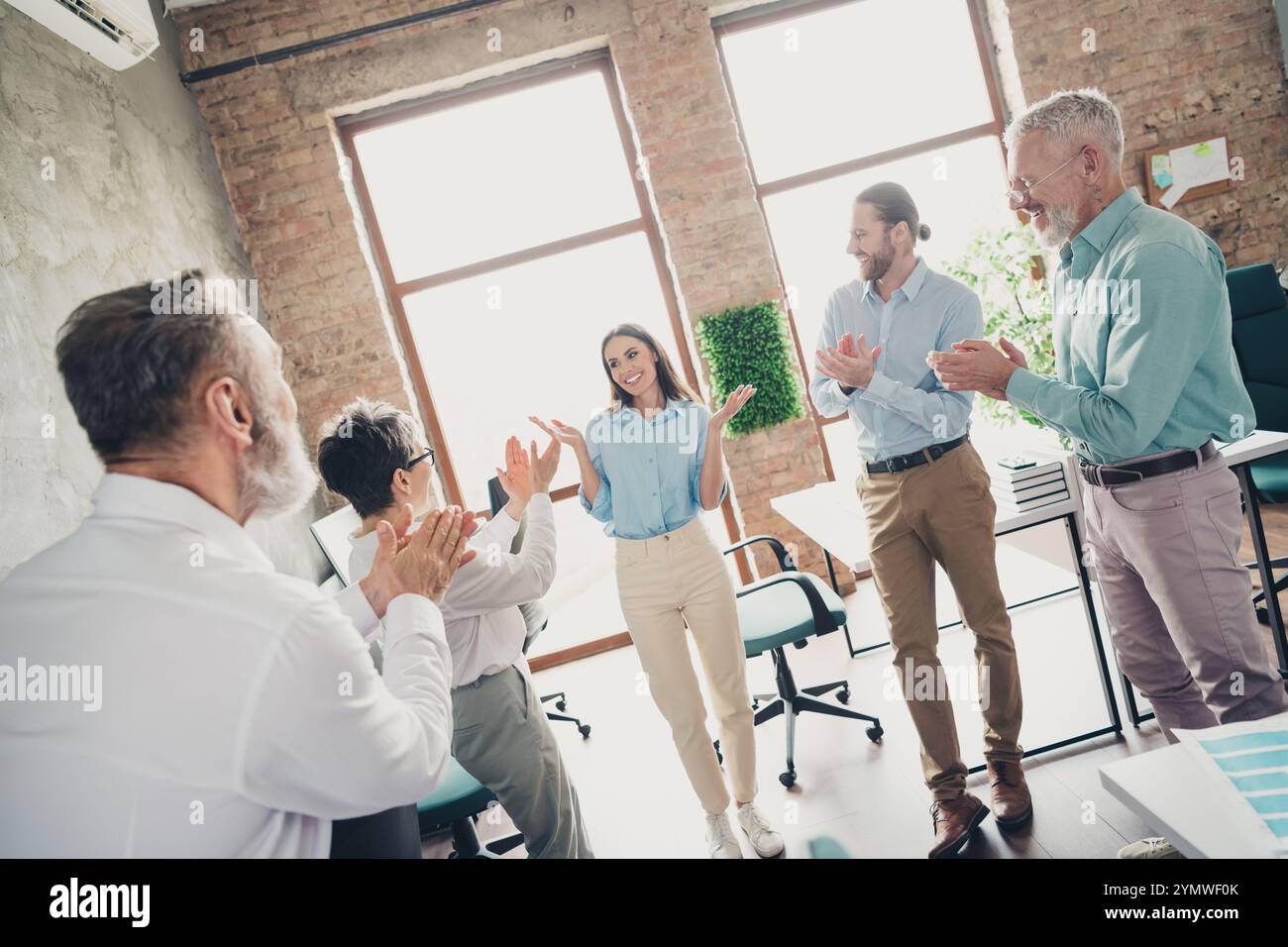 Photo of teamwork startup partners applause clapping hands comfortable ...