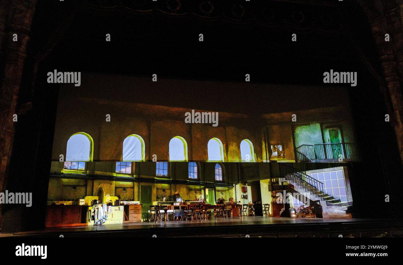 the opening projected set design rises to reveal an actual kitchen in ...