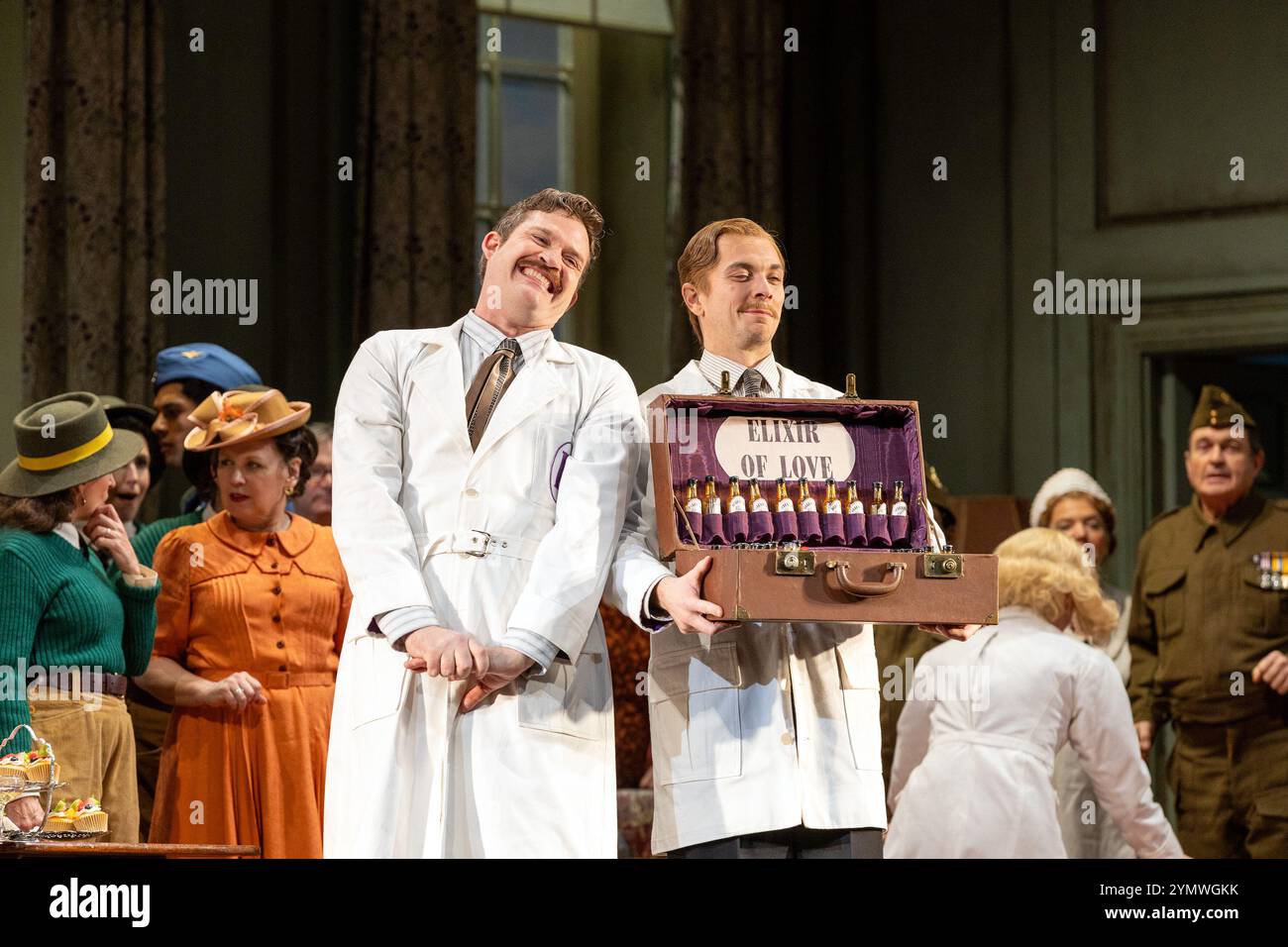l-r: Brandon Cedel (Dulcamara), Reece Causton in THE ELIXIR OF LOVE at English National Opera ...