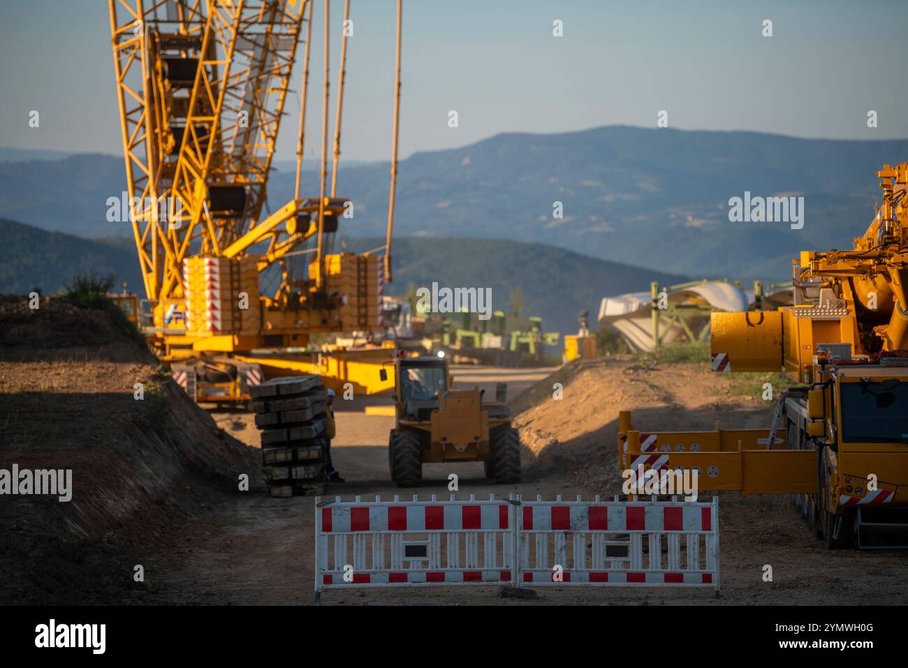Construction site on windmill farm during day Stock Photo - Alamy
