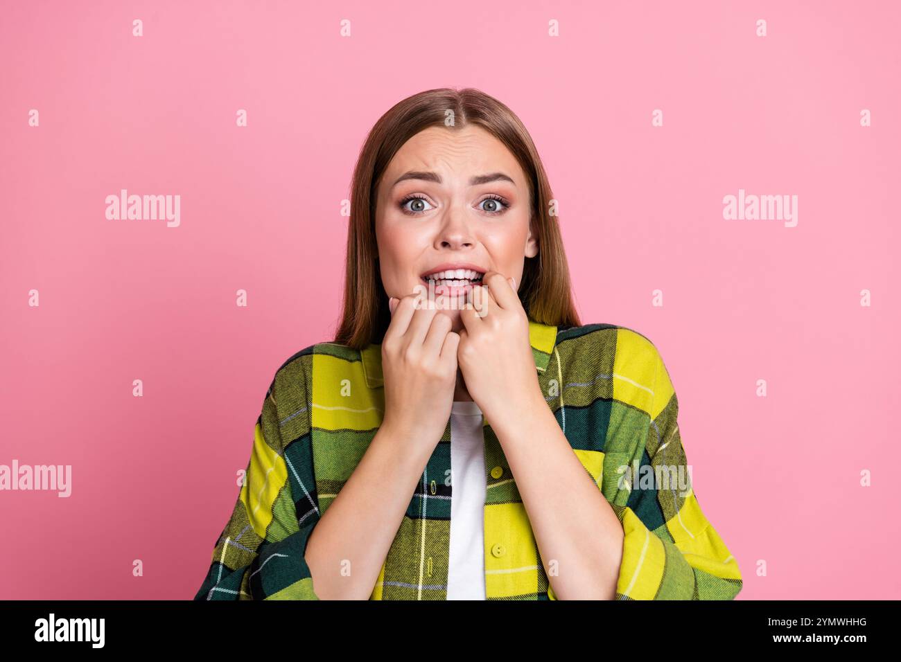 Photo portrait of pretty young girl scared reaction wear yellow plaid ...