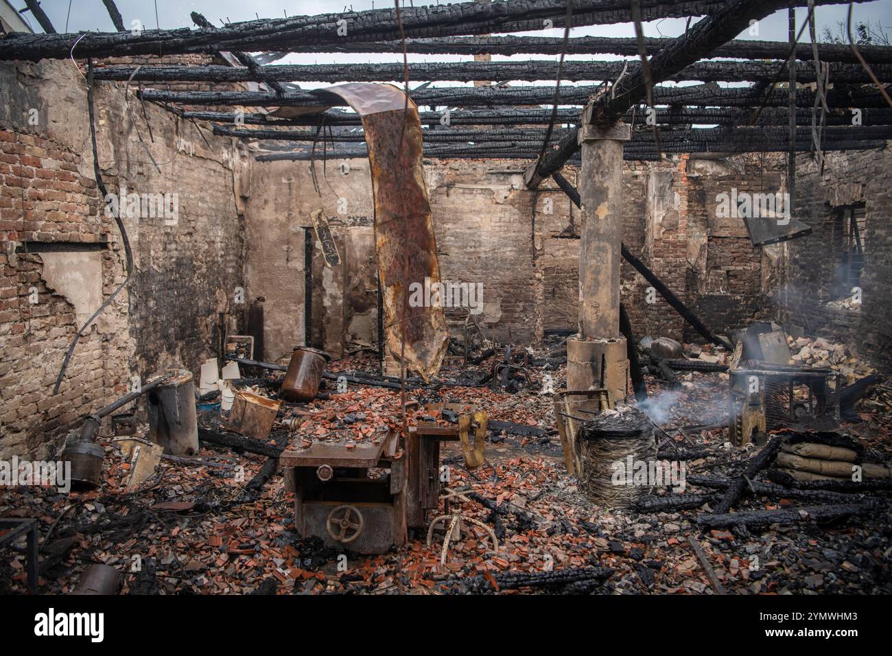 Old abandoned building burned down in a city center. Building destroyed ...