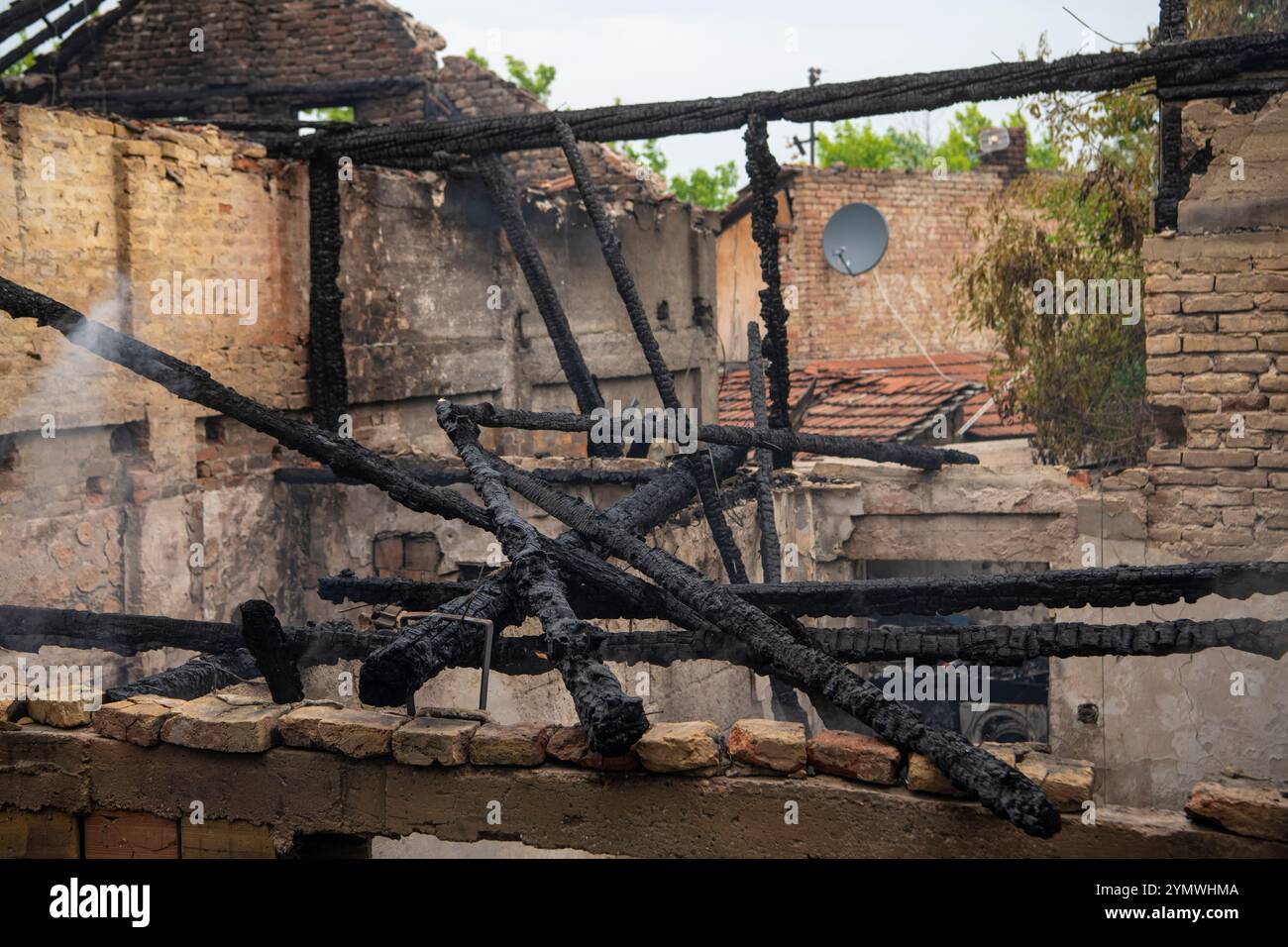 Old abandoned building burned down in a city center. Building destroyed ...