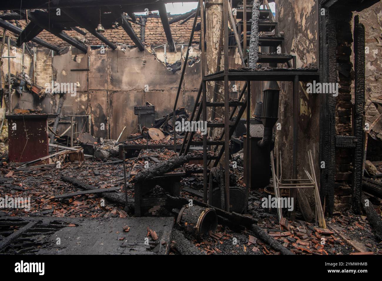Old abandoned building burned down in a city center. Building destroyed ...