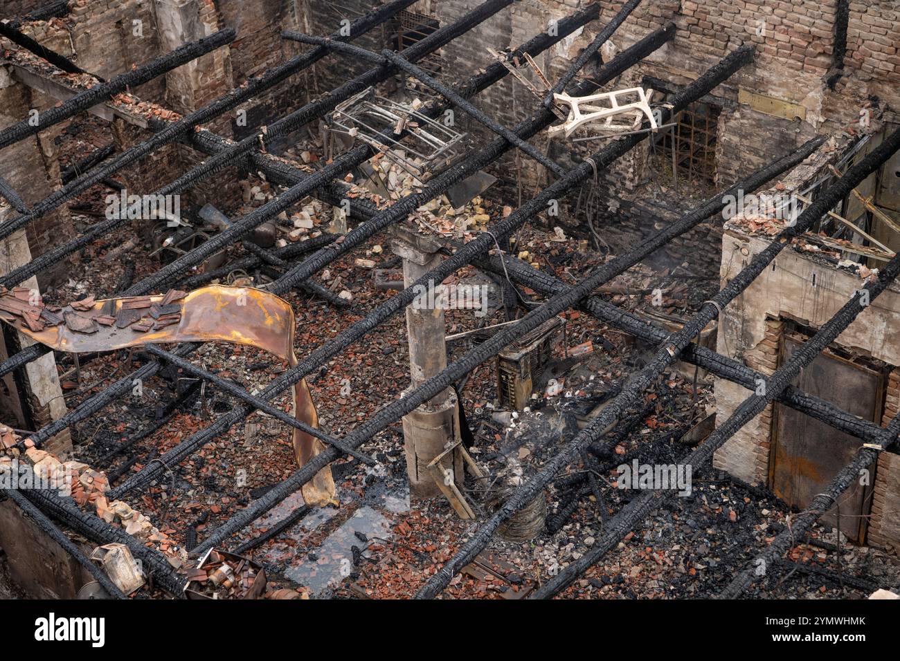 Old abandoned building burned down in a city center. Building destroyed ...
