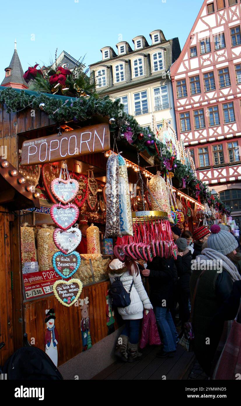 FRANKFURT, GERMANY-DECEMBER 15,2013:Unidetified People buying Popcorn ...