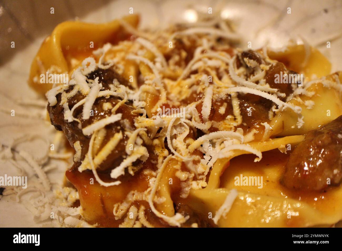 Italian cuisine: strichetti with ragu sauce and ricotta salata (salted ...