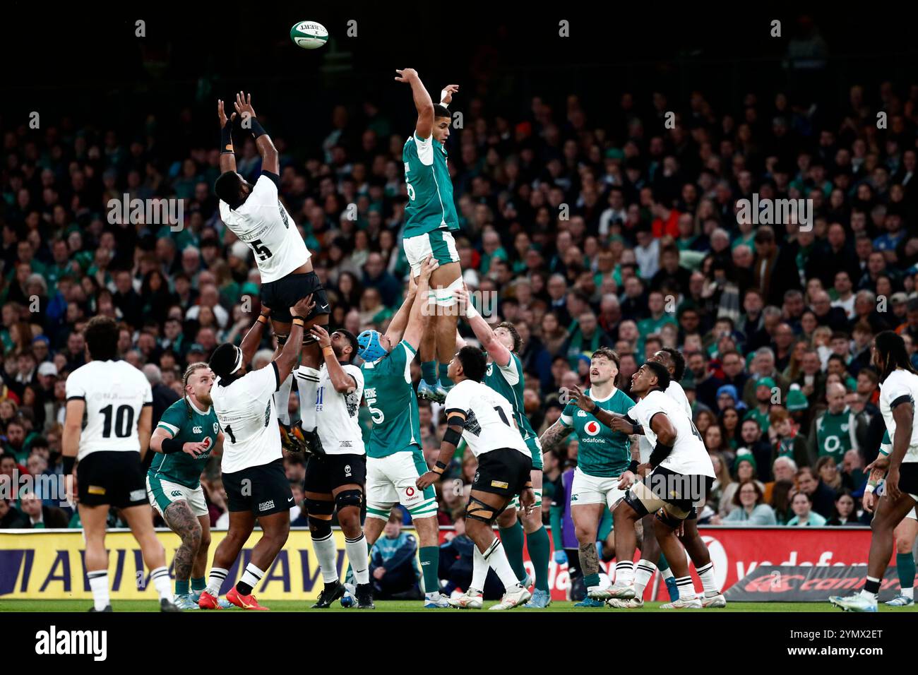 Fiji's Temo Mayanavanua, top left, compete to catch the ball Ireland's ...