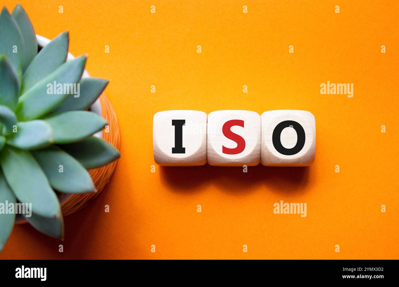 ISO standards quality control symbol. Concept word ISO on wooden cubes ...