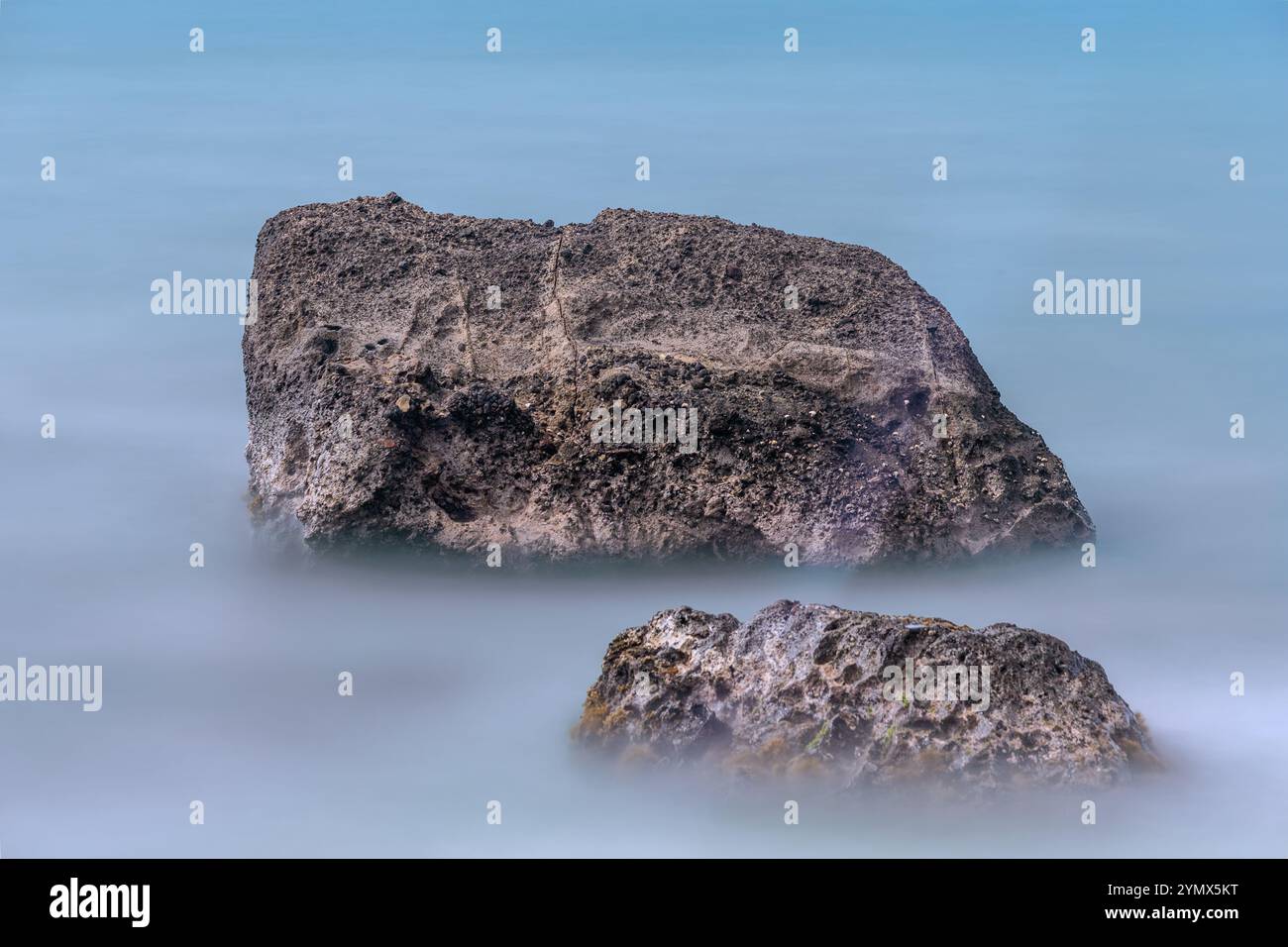 Rocks formation at the beach. Beautiful long exposure rocks in the sea ...