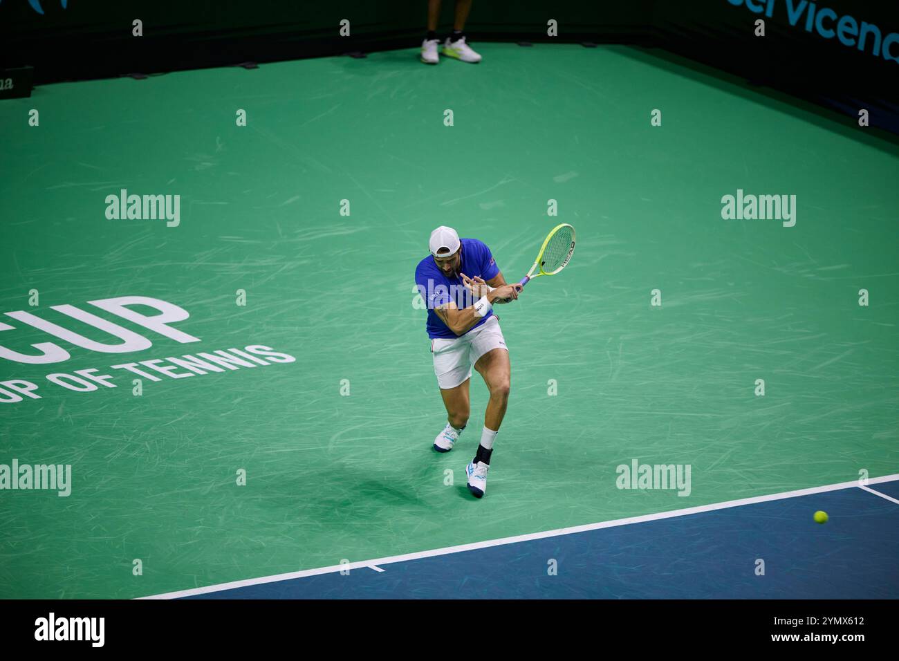 Matteo Berrettini of Italy team in action against Thanasi Kokkinakis of ...