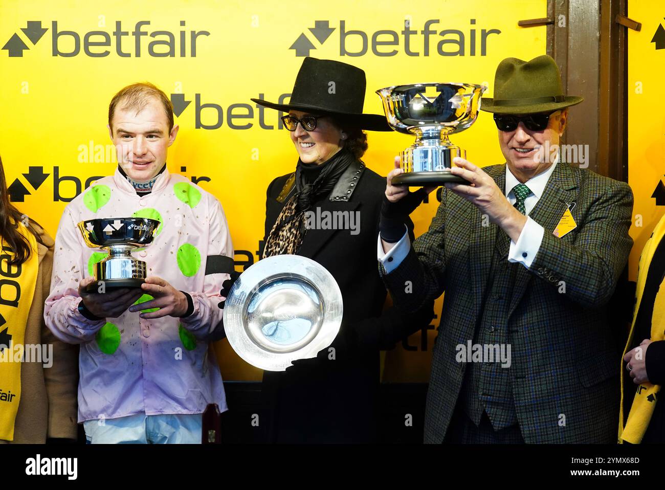 Jockey Charlie Deutsch, trainer Venetia Williams and owner Rich Ricci ...