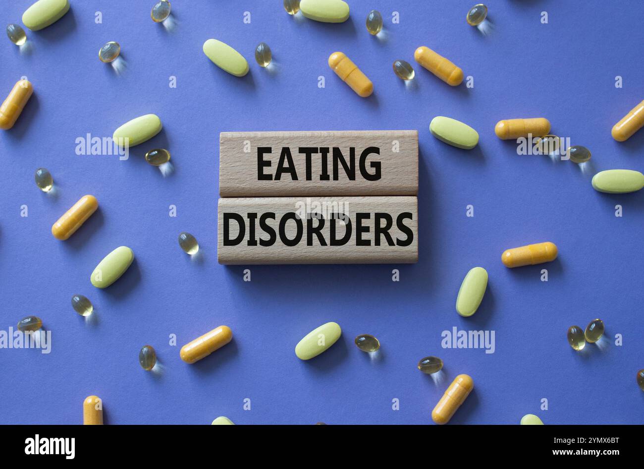 Eating Disorders symbol. Concept word. Eating Disorders on wooden ...