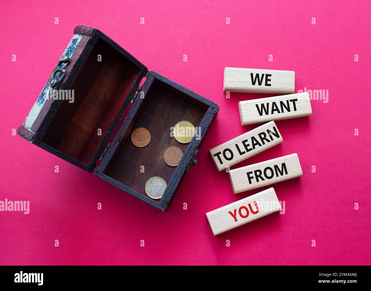 We want to learn from you symbol. Wooden blocks with words We want to ...