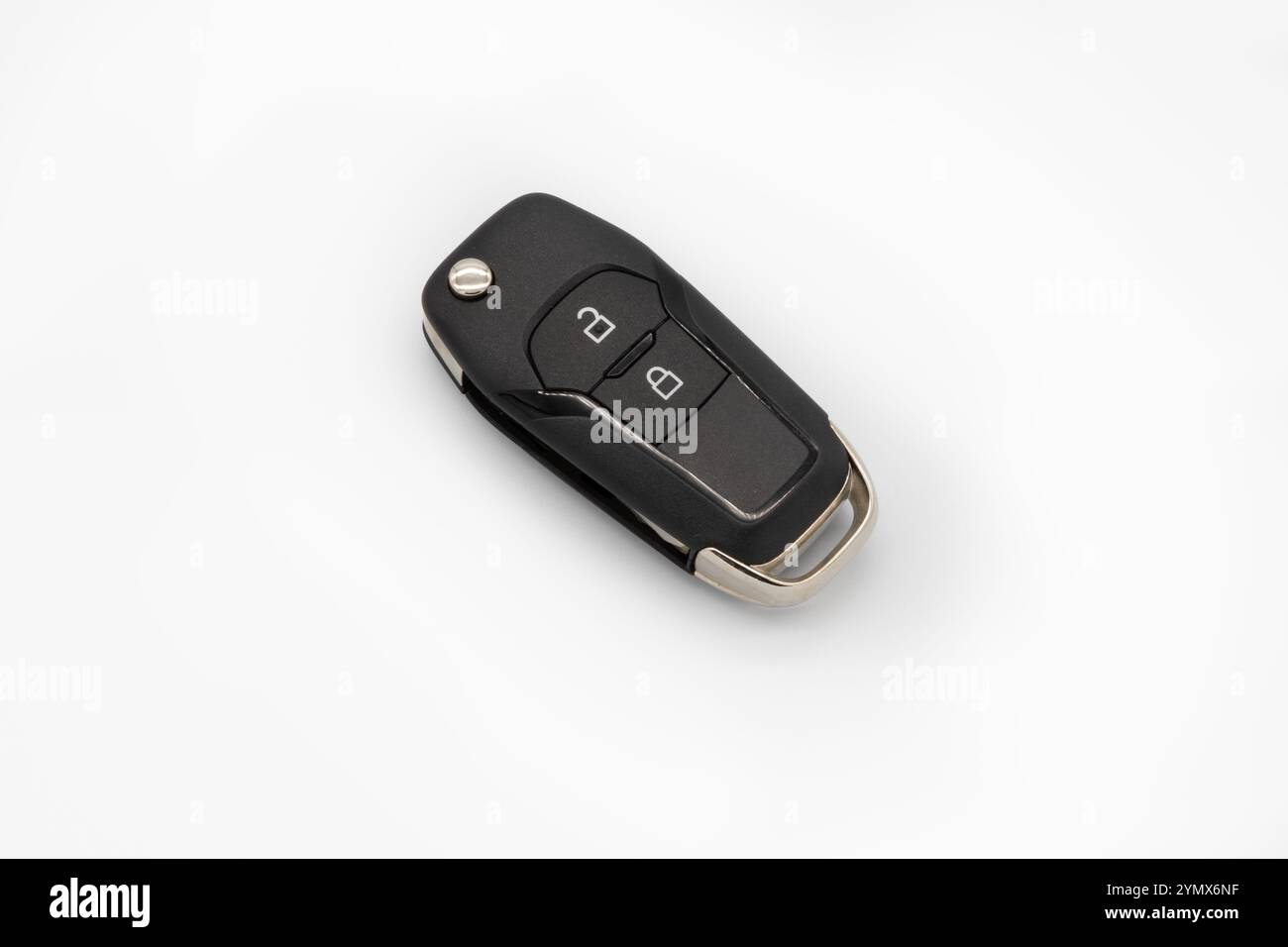 Close-up of a modern car key with remote control on a white background ...