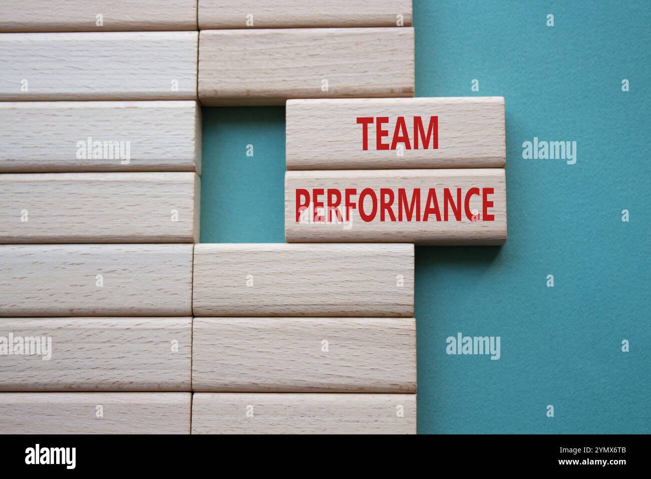 Team Performance symbol. Wooden blocks with words Team Performance ...