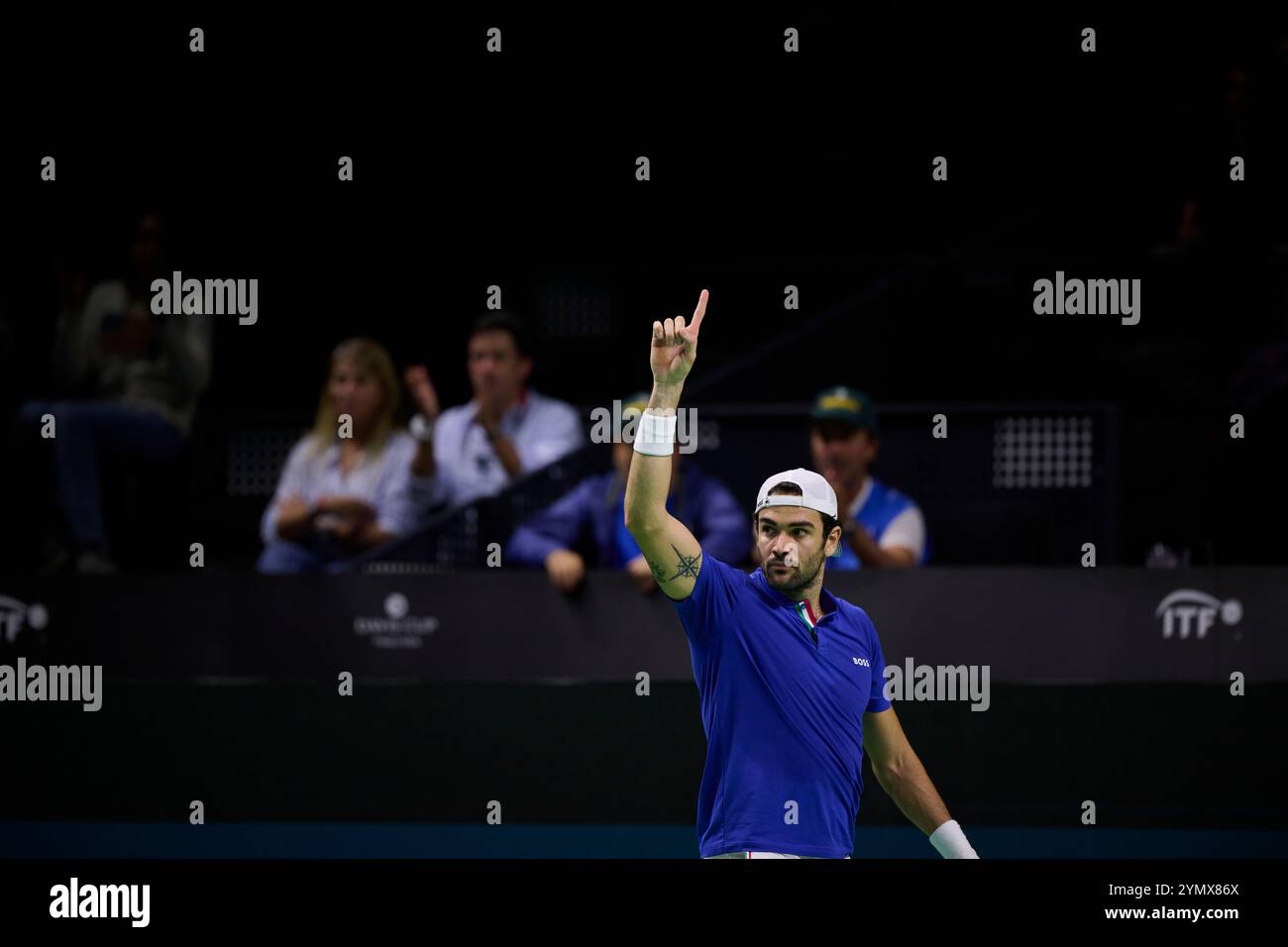 Matteo Berrettini of Italy team in action against Thanasi Kokkinakis of ...
