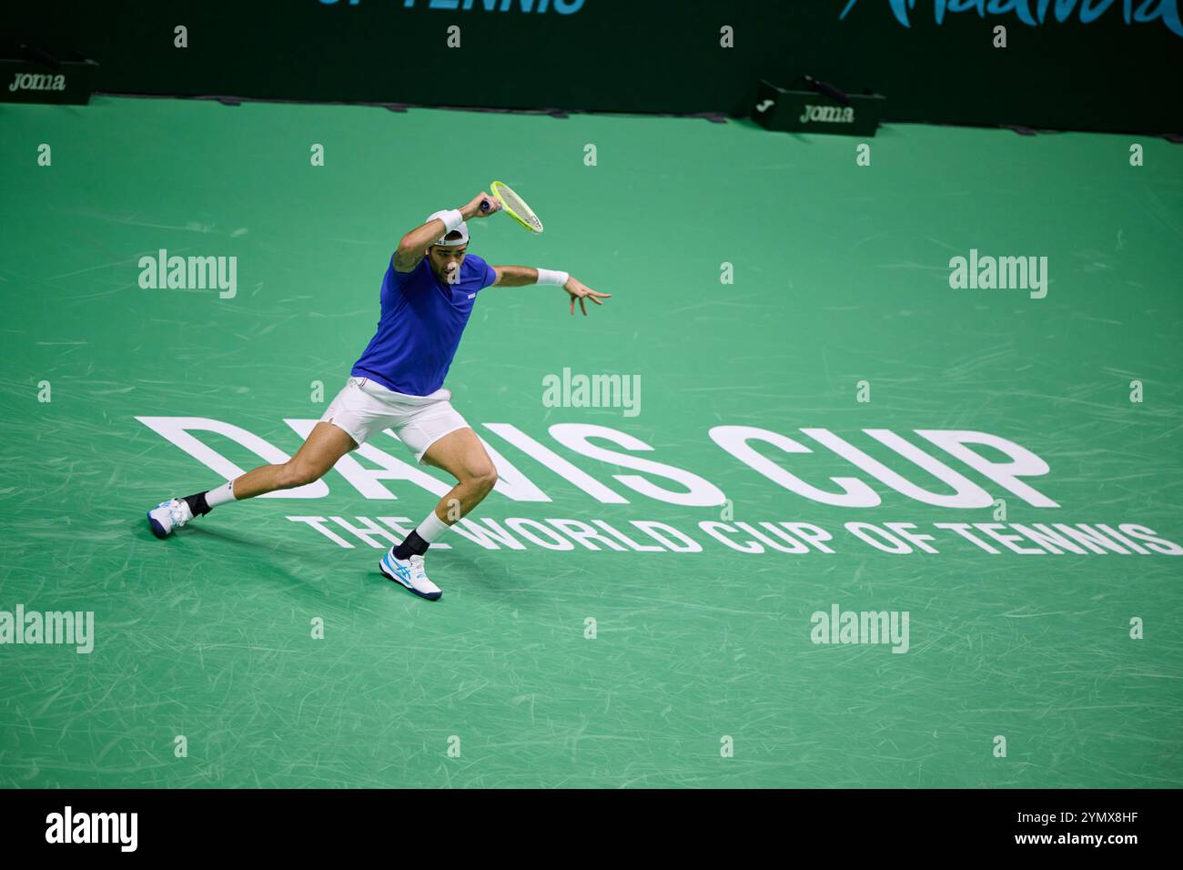 Matteo Berrettini of Italy team in action against Thanasi Kokkinakis of ...