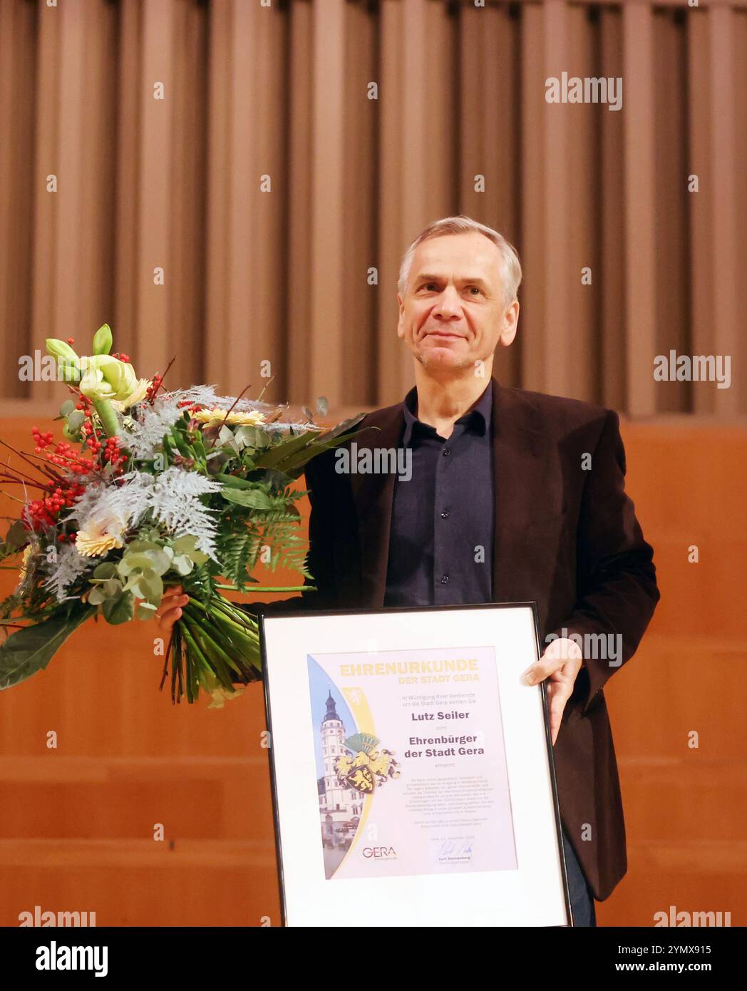 23 November 2024, Thuringia, Gera: Writer Lutz Seiler stands with the ...