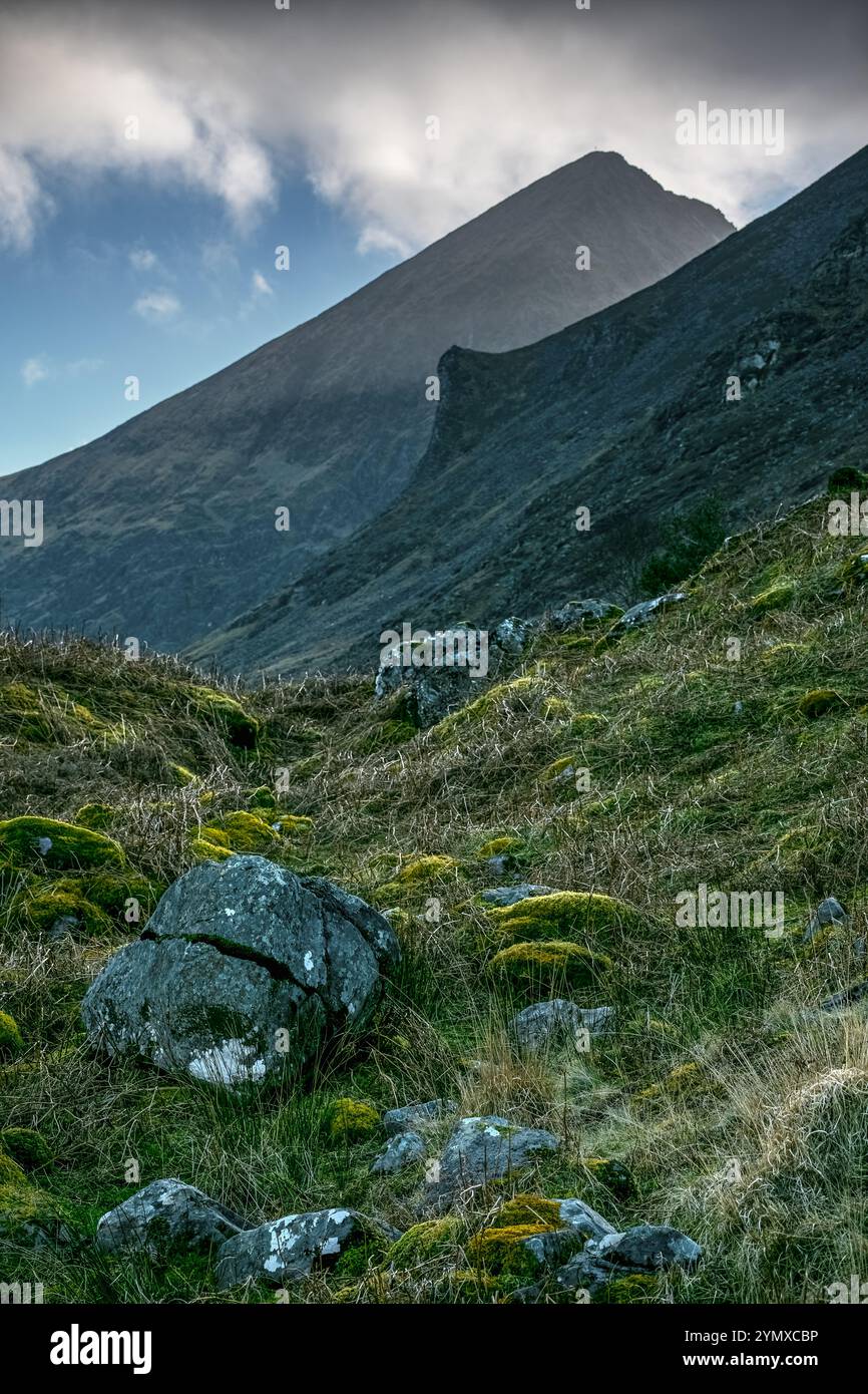 Dramatic dark rocky mountain patches hi-res stock photography and ...