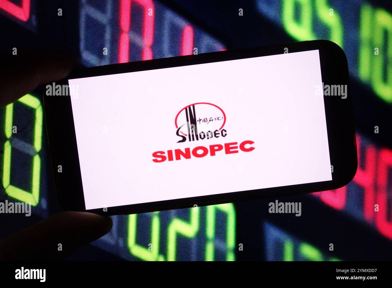 In this photo illustration, the Sinopec company logo is seen displayed ...