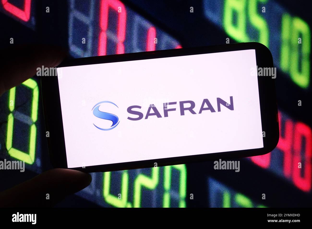In this photo illustration, the Safran company logo is seen displayed ...