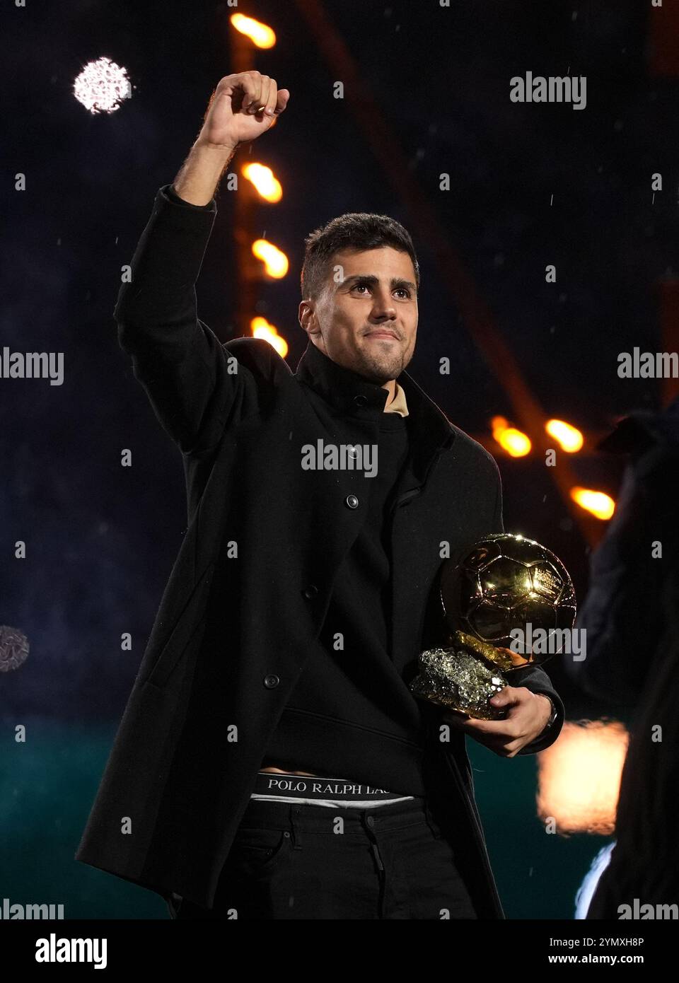 Manchester City's Rodri poses with the Ballon d'Or trophy before the ...