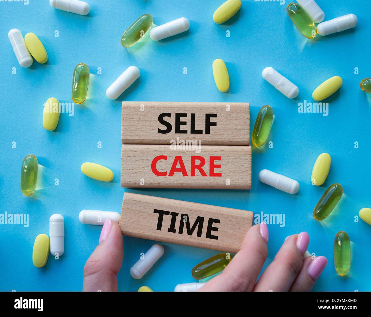 Self-care Time symbol. Concept words Self-care Time on wooden blocks ...