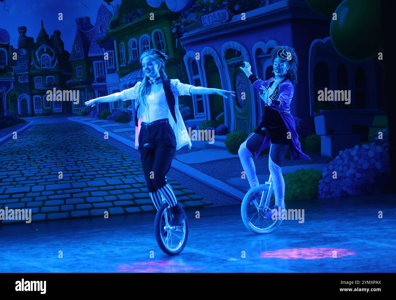 Chennai, India. 23rd Nov, 2024. Artists dressed as clowns perform on ...