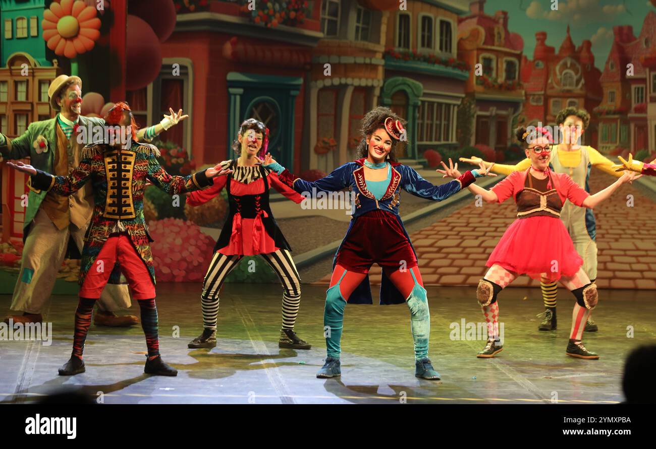 Artists dressed as clowns perform on stage during the International ...