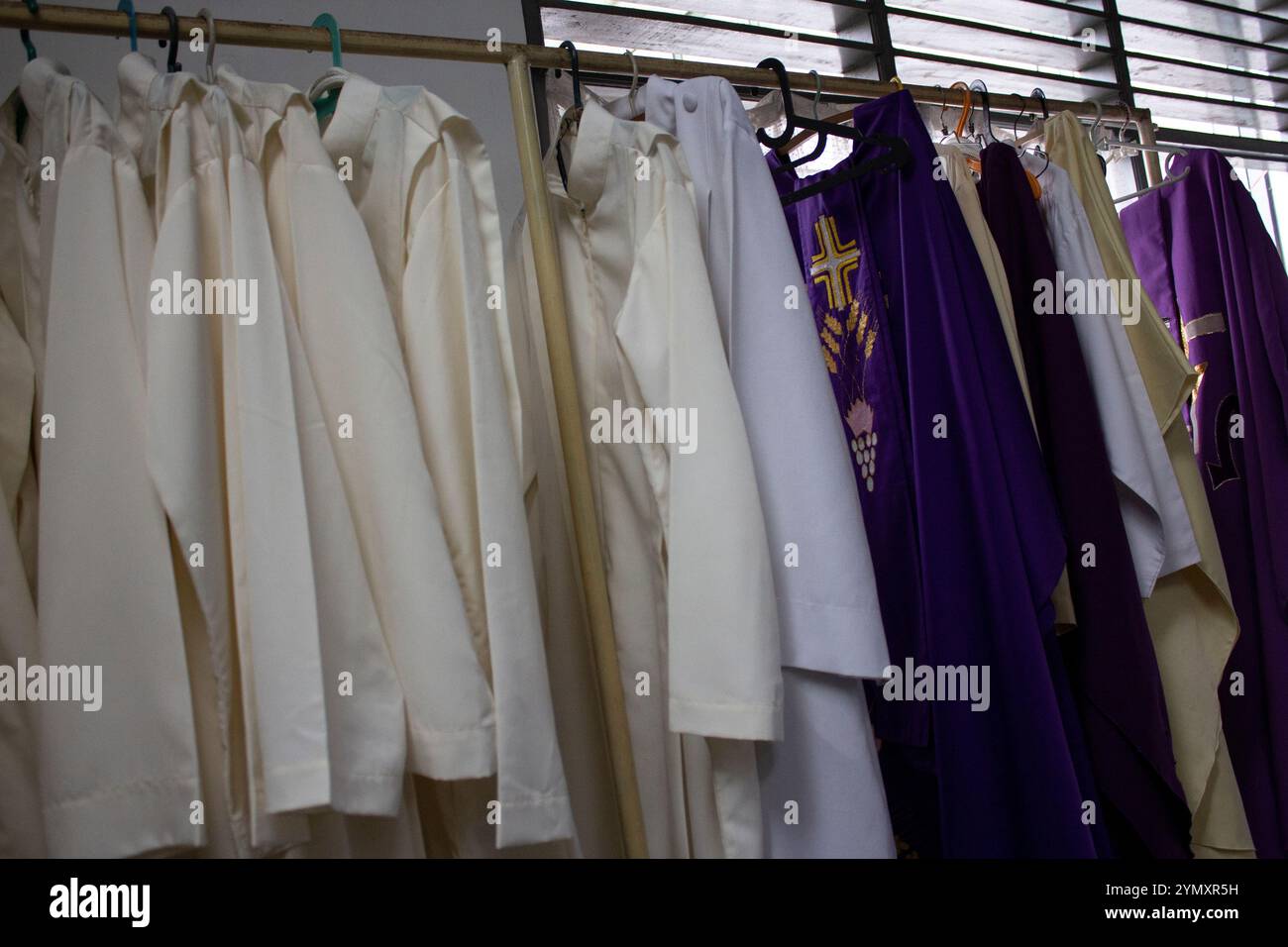 The chasuble or robe of a Catholic priest is usually worn when leading ...