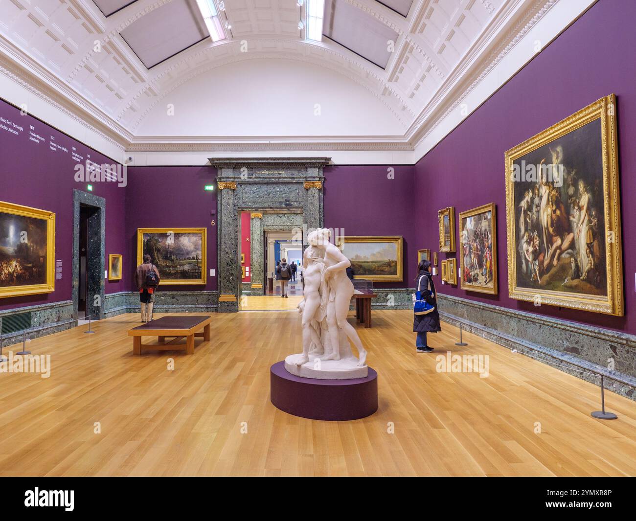Sculpture and classical oil paintings hanging on the walls inside the ...