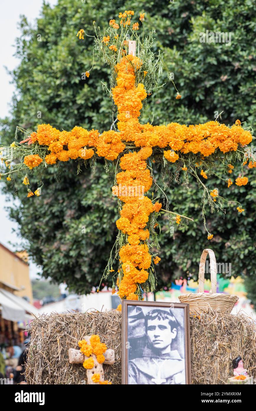 Day of the Dead cross decorated with Mexican Marigolds (the flower of ...