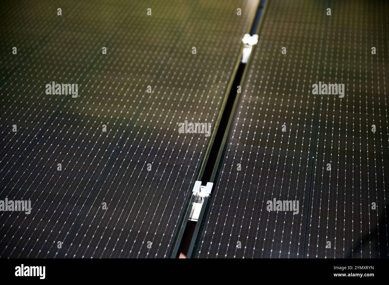 Close up of mounting hardware on solar panel, focusing on the details ...