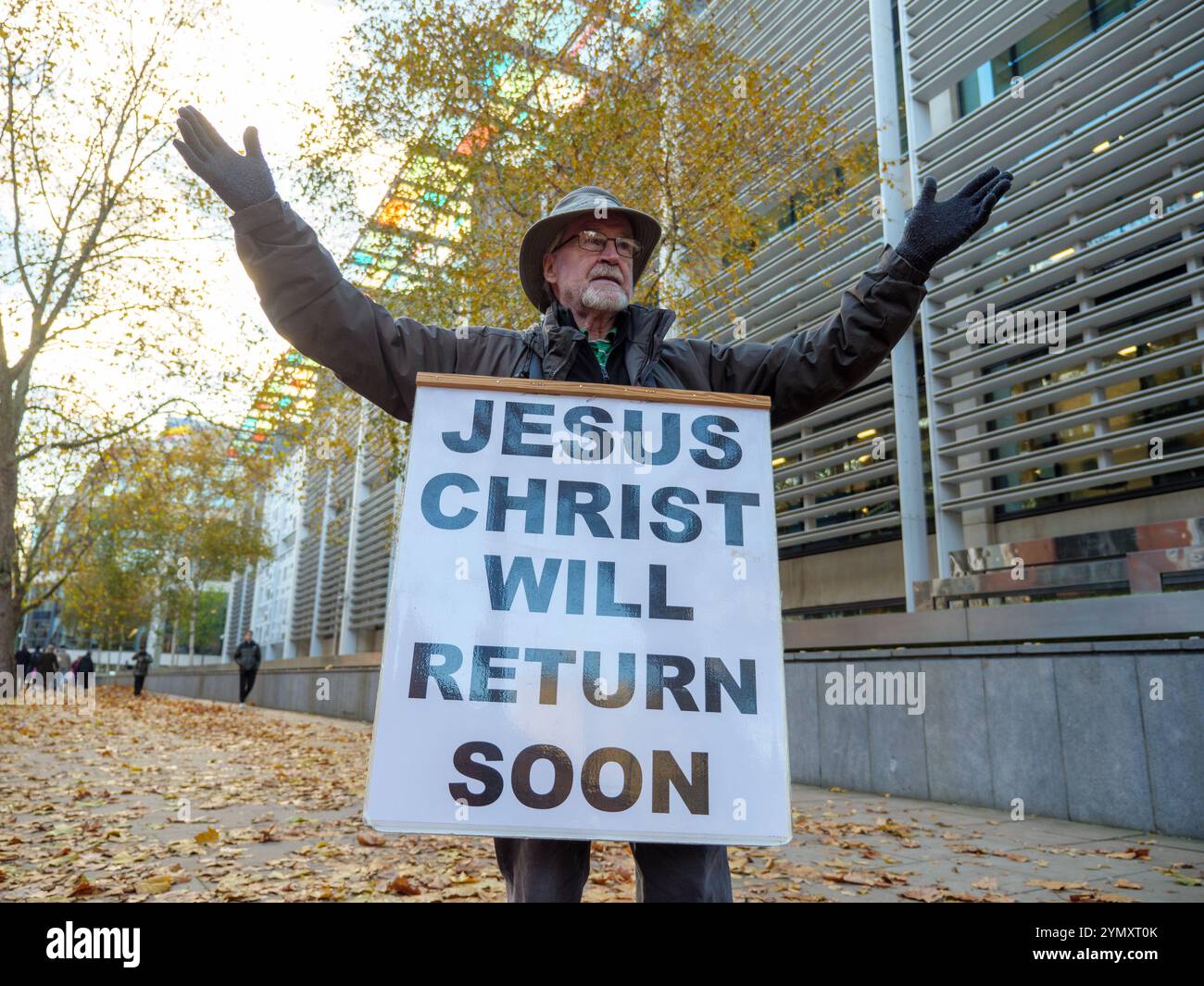 Religious Evangelical Christian man wearing sign proclaiming the return ...