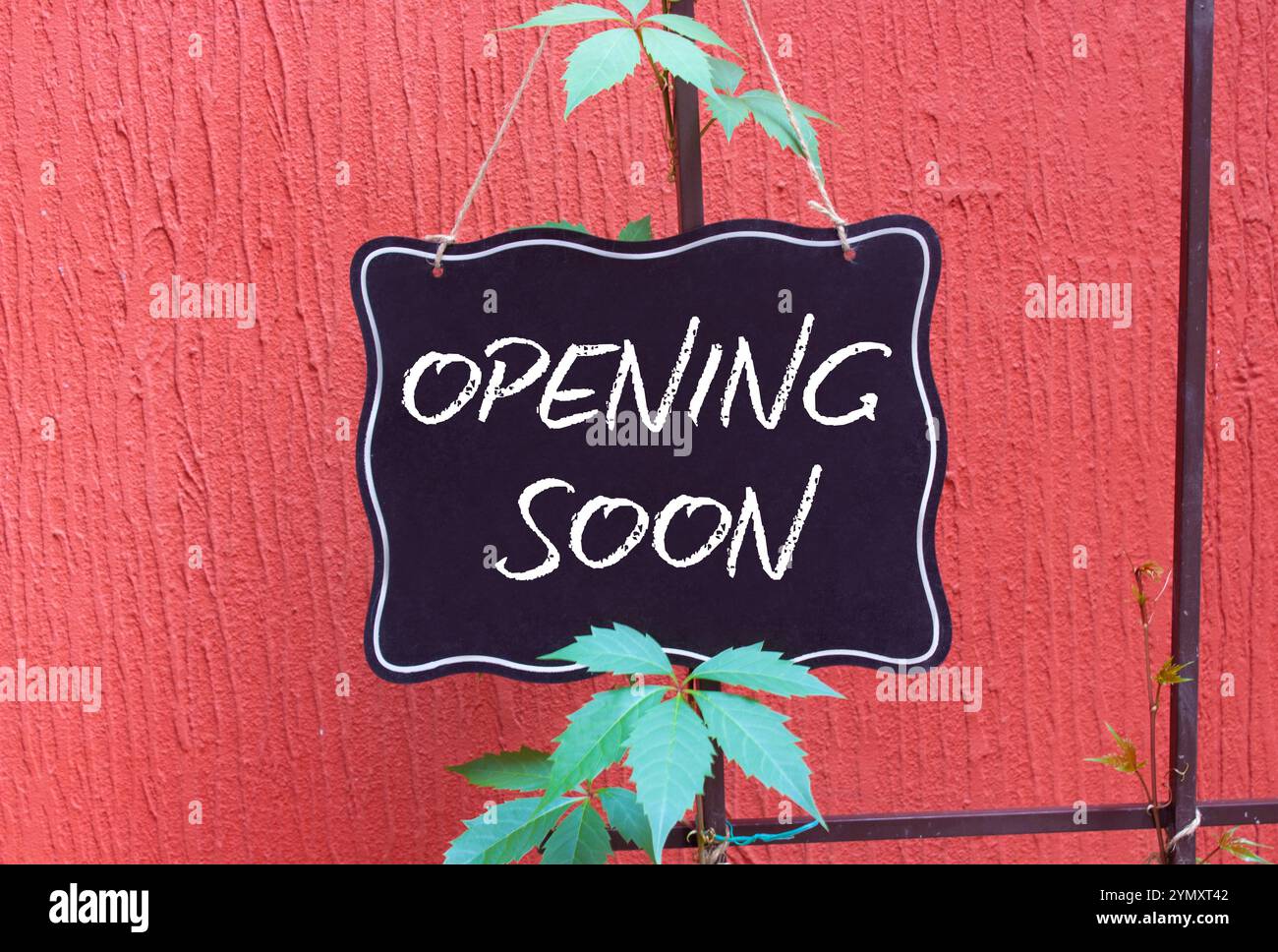 Opening soon symbol. Concept word Opening soon on black chalk ...