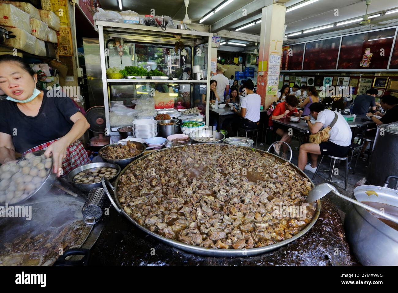 Bangkok, Thailand - June 27, 2023: A giant pan full of stewed beef and ...