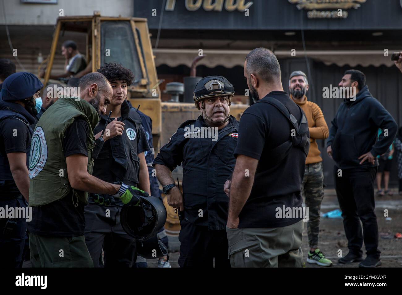 First responders, including Lebanese civil defence, on the scene ...