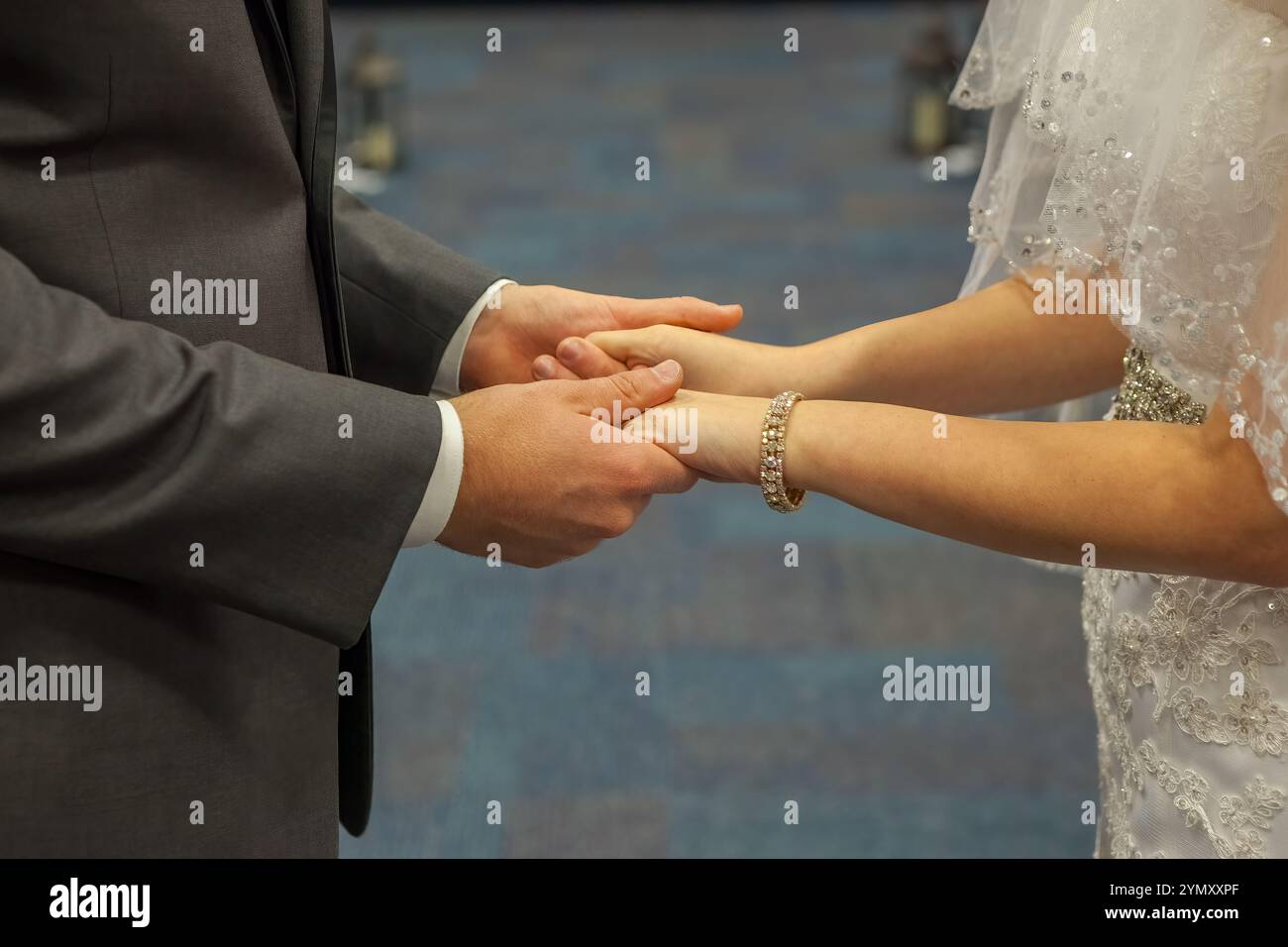 Bride and Groom Holding Hands at the Church Altar During Wedding ...
