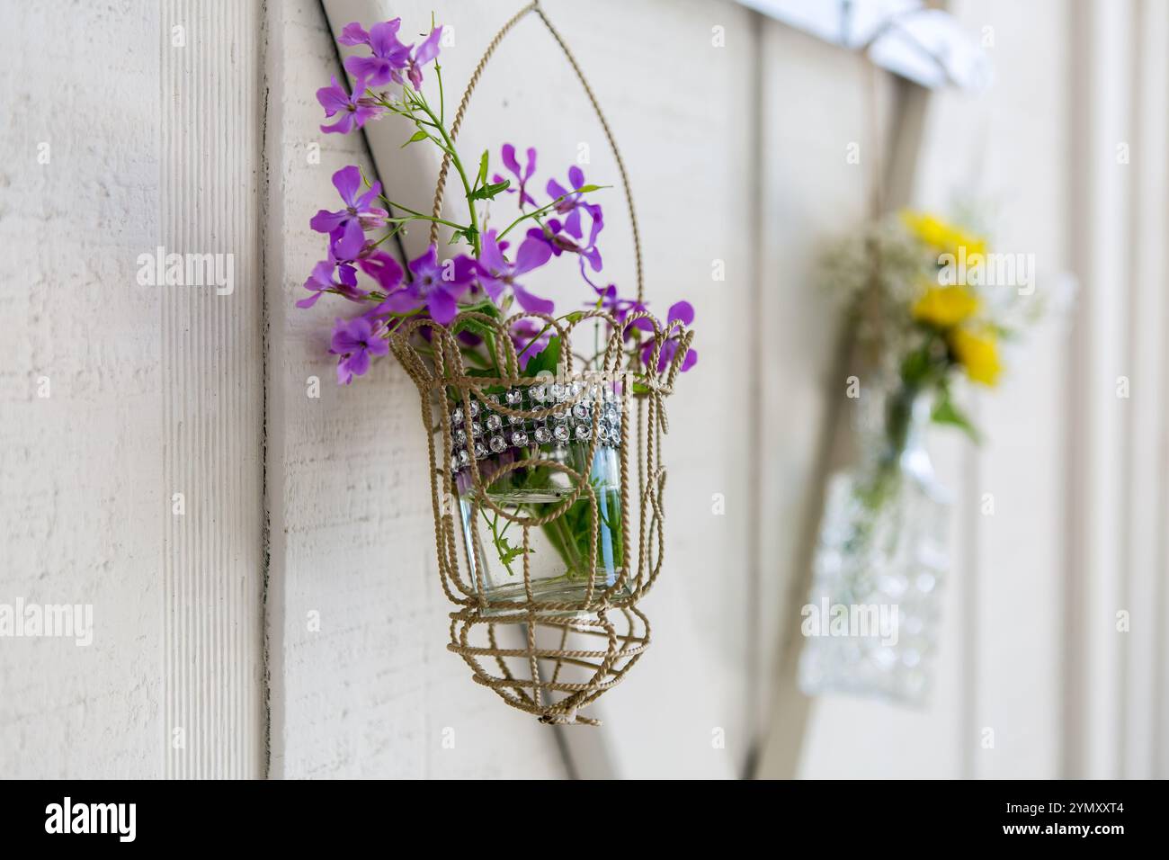 Rustic White Barn Wedding with Elegant Floral Wall Backdrop Stock Photo ...