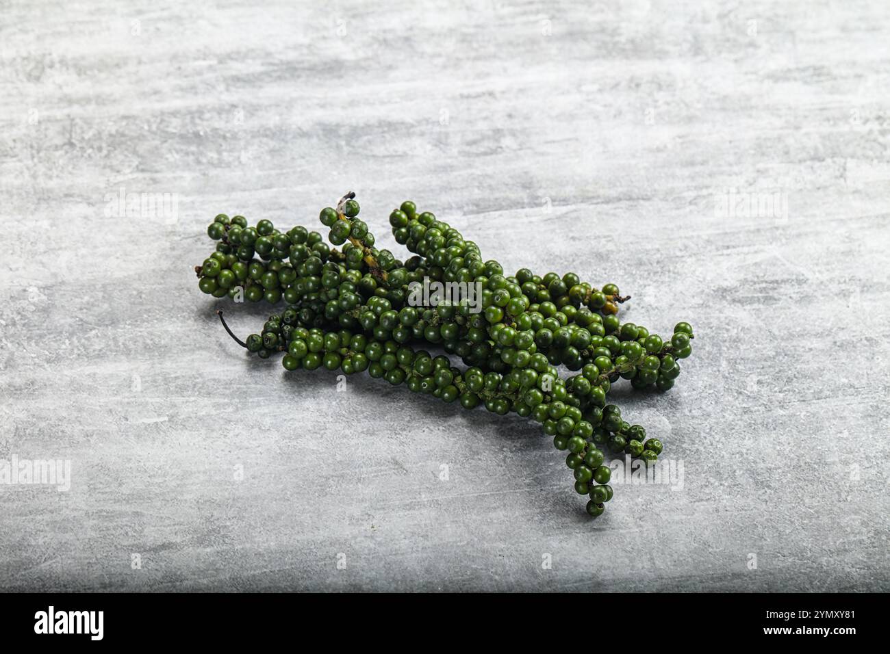 Fresh ripe green peppercon heap isolated Stock Photo - Alamy