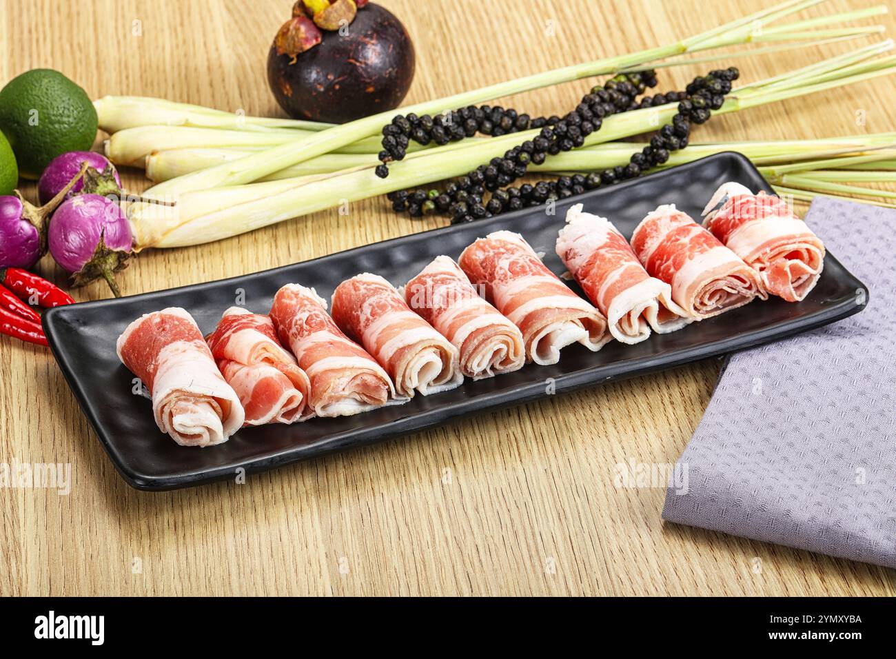 Raw beef bacon roll for grill Stock Photo - Alamy