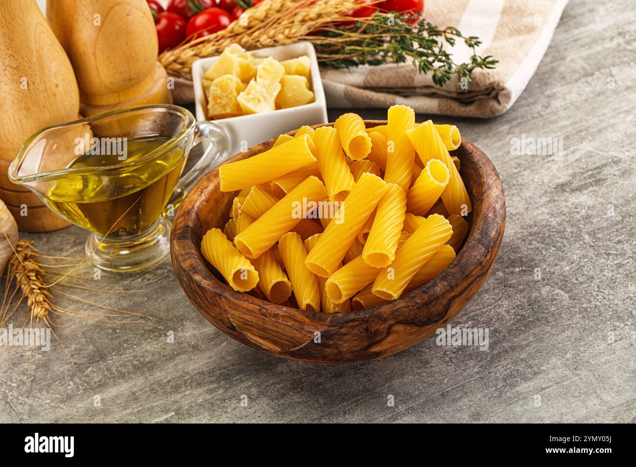 Italian cuisine - raw dry tortiglioni pasta Stock Photo - Alamy