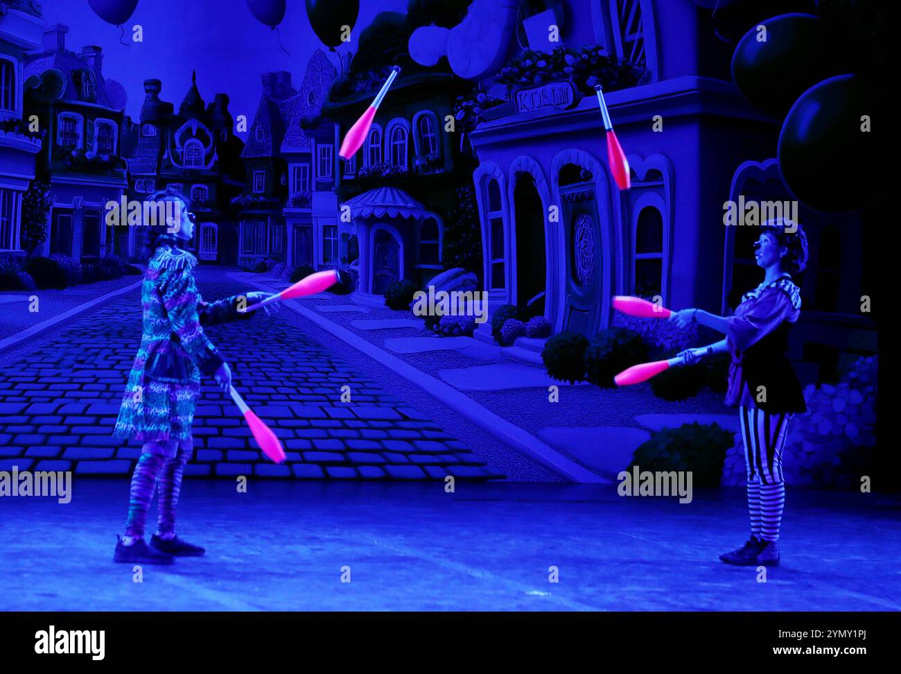 Leisure & Entertainment Artists dressed as clowns perform on stage ...