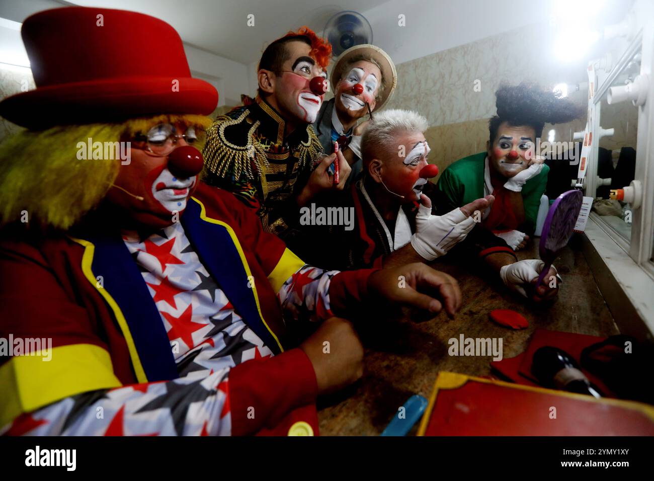 Leisure & Entertainment Artists dressed as clowns perform on stage ...