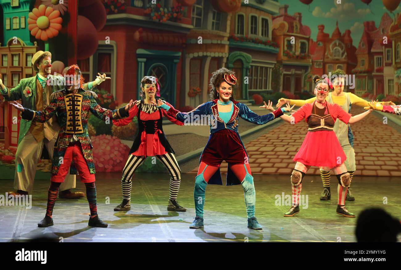 Leisure & Entertainment Artists dressed as clowns perform on stage ...