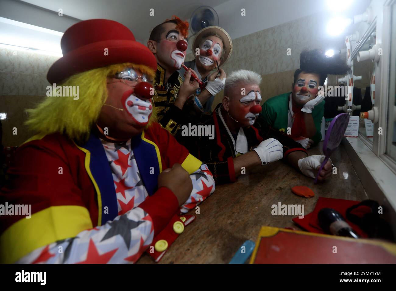 Leisure & Entertainment Artists dressed as clowns perform on stage ...