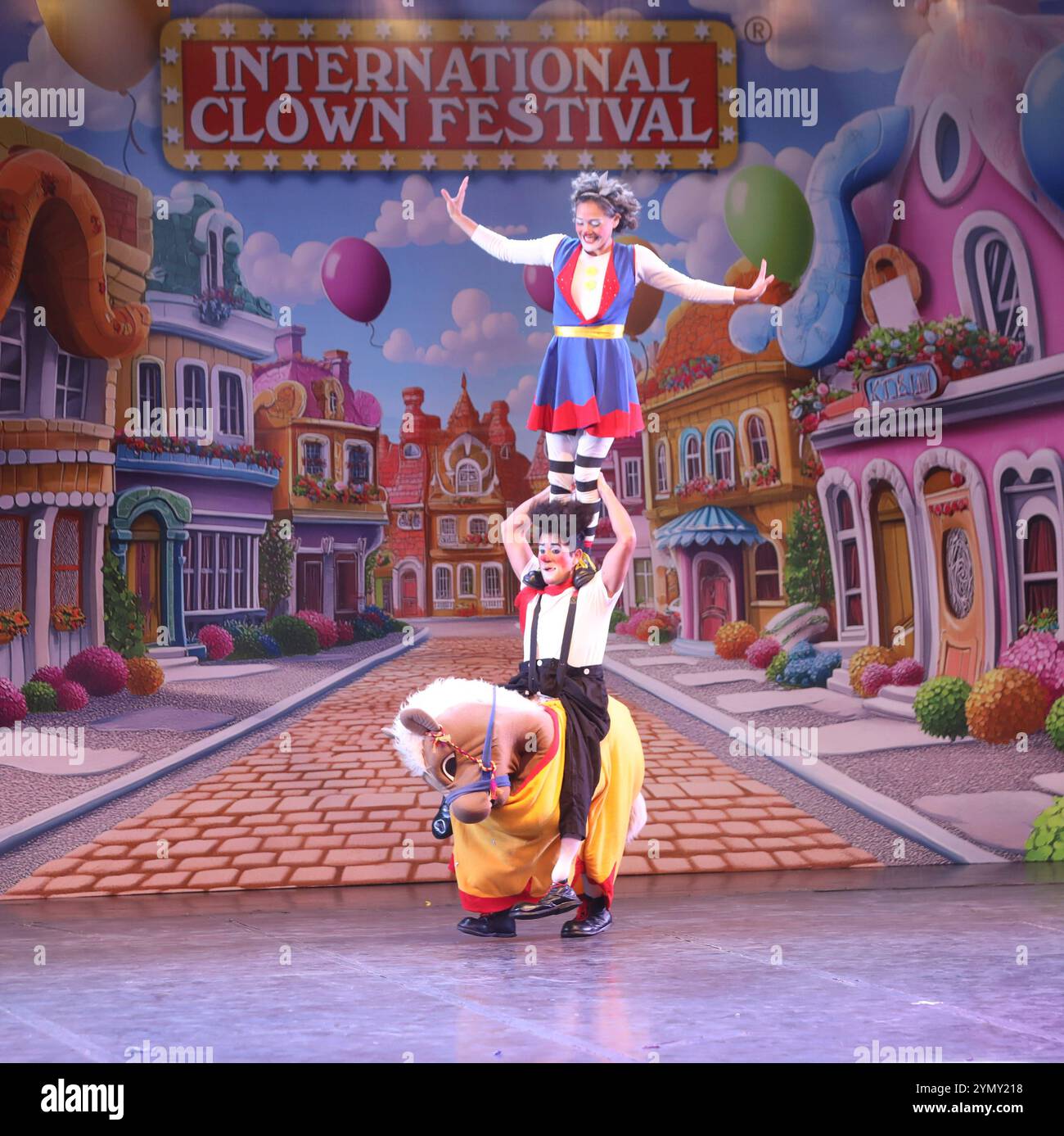 Leisure & Entertainment Artists dressed as clowns perform on stage ...