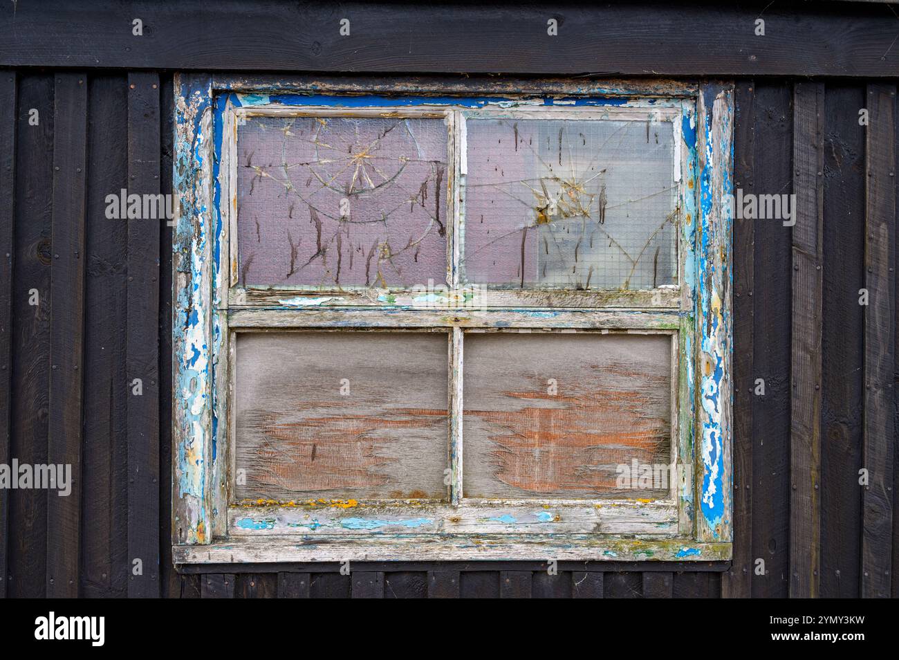 Old damaged and repaired shed window, UK Stock Photo - Alamy