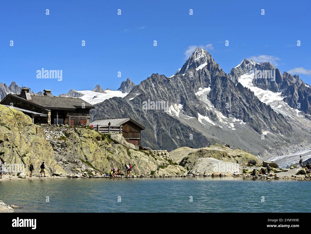 Lac Blanc mountain hut on the Lac Blanc mountain lake, behind the peaks ...